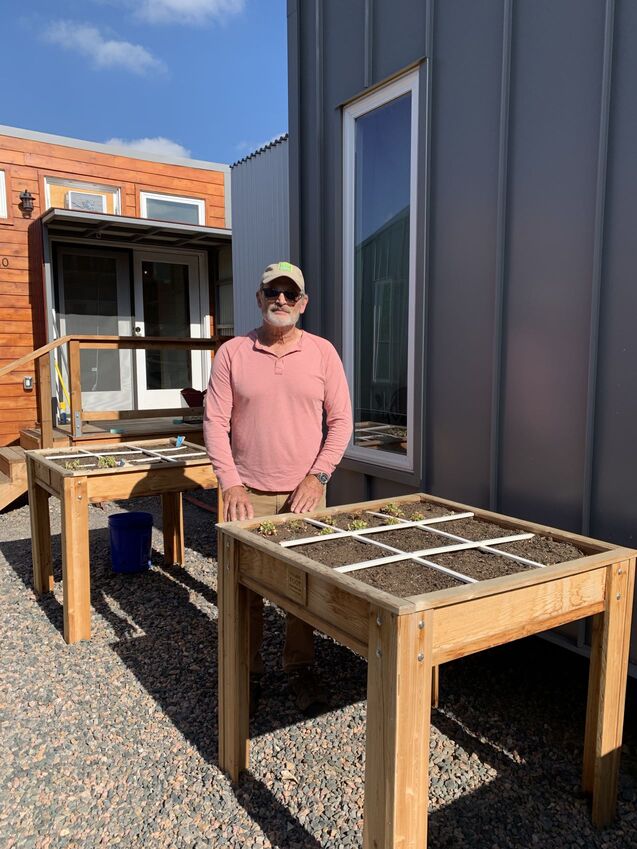 Elevated square foot gardening beds in Globeville Village Community